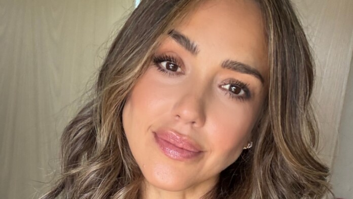 At 45, Jessica Alba radiates in a structured lace look