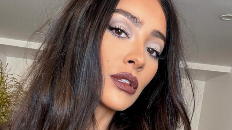 Shay Mitchell revives the trend of sparkly dresses in a monochrome version.